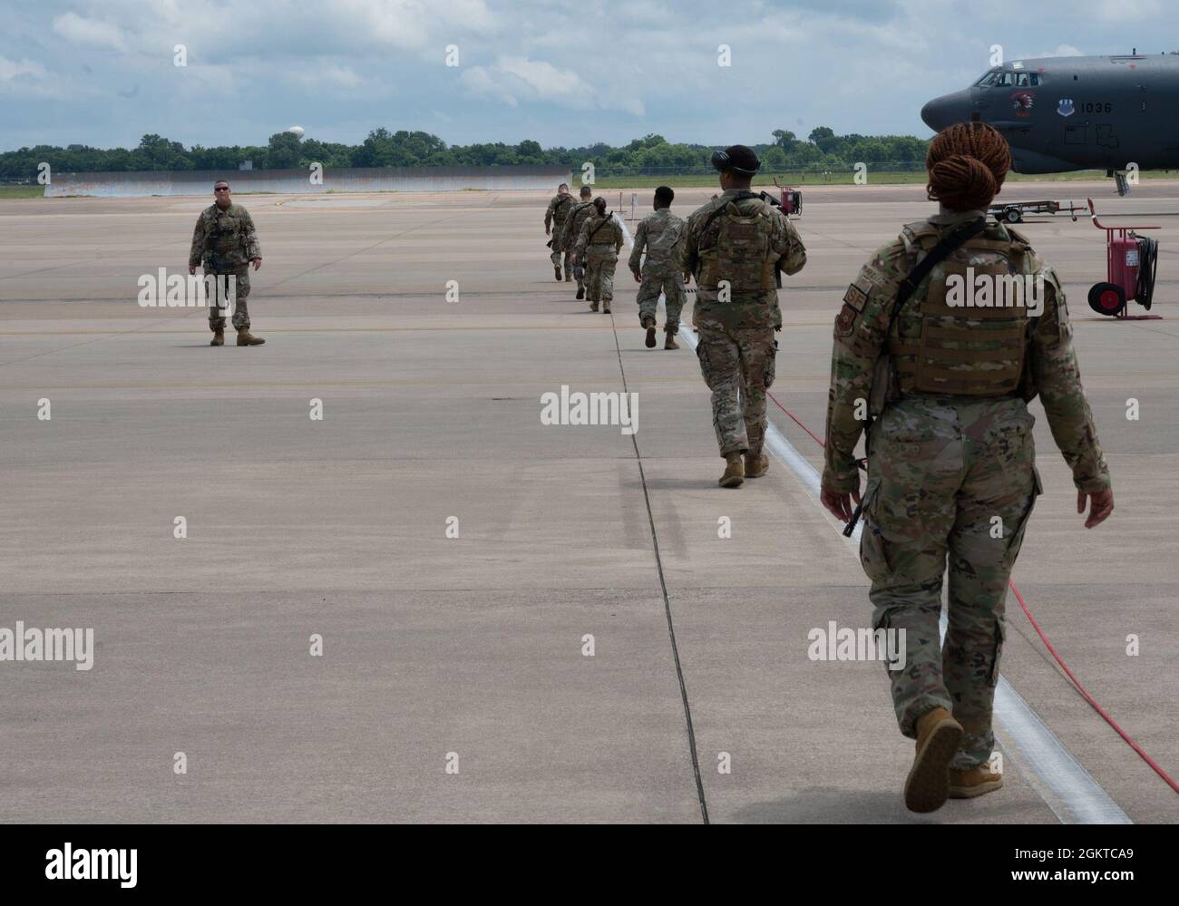 Airmen from the 2nd Security Forces Squadron prepare for a ramp purge ...