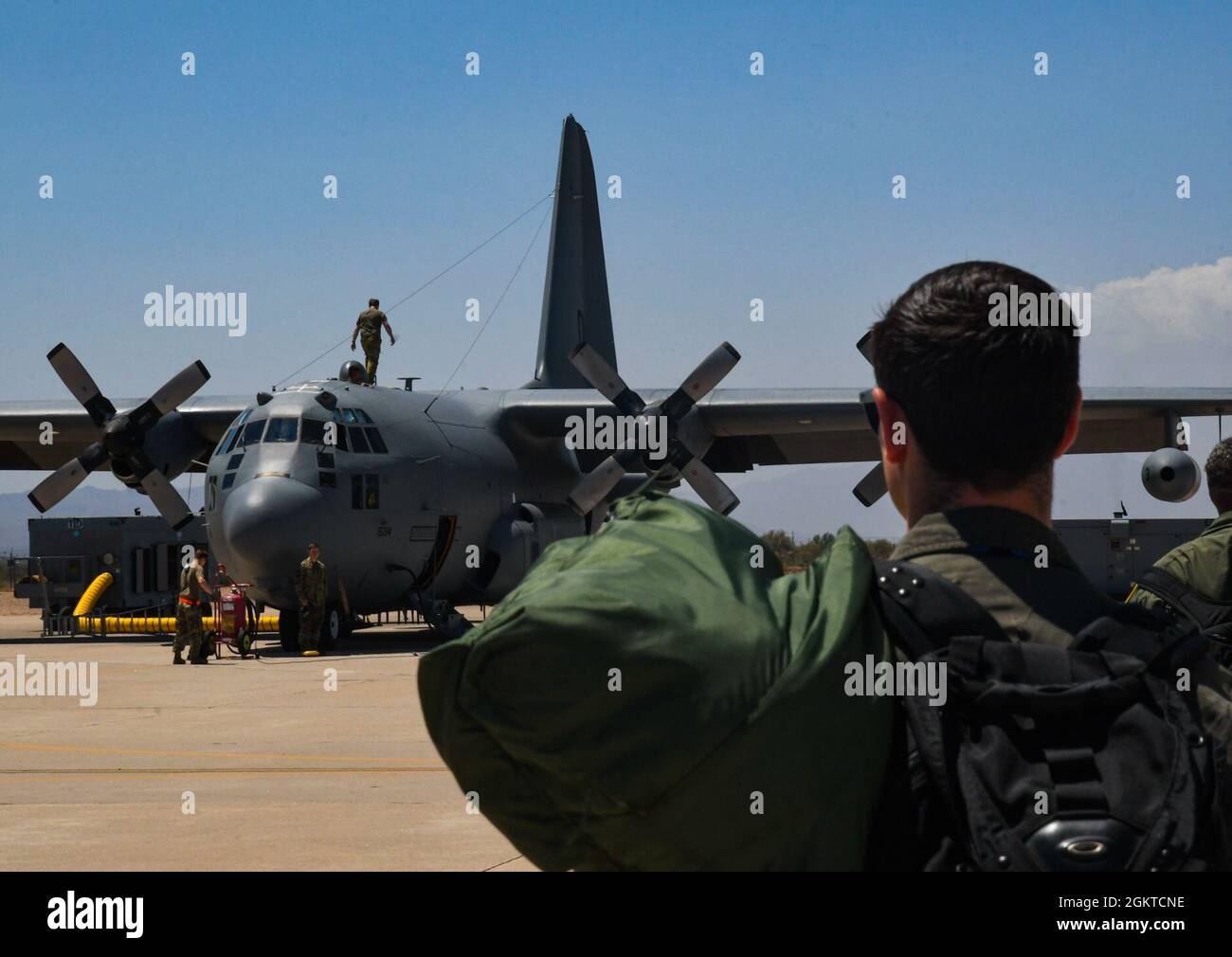 A pilot from the 55th Electronic Combat Group walks towards a U.S. Air ...