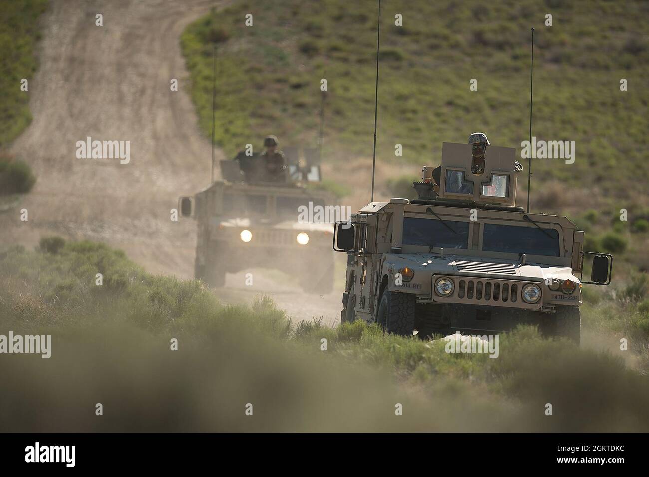 The lead vehicles of the Cavalry Scout student soldiers enter the ...