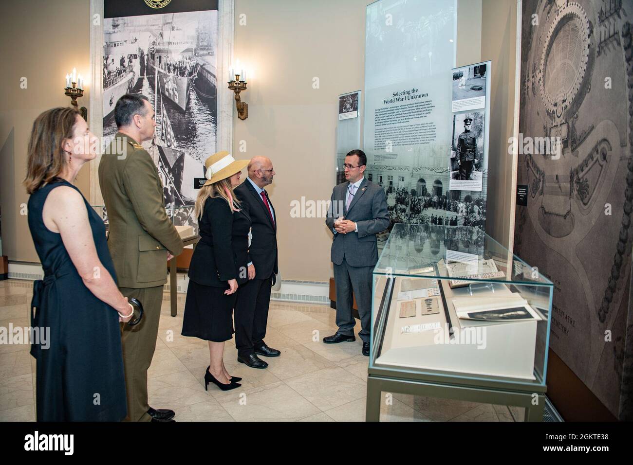 Tim Frank (right), historian, Arlington National Cemetery, gives a tour ...