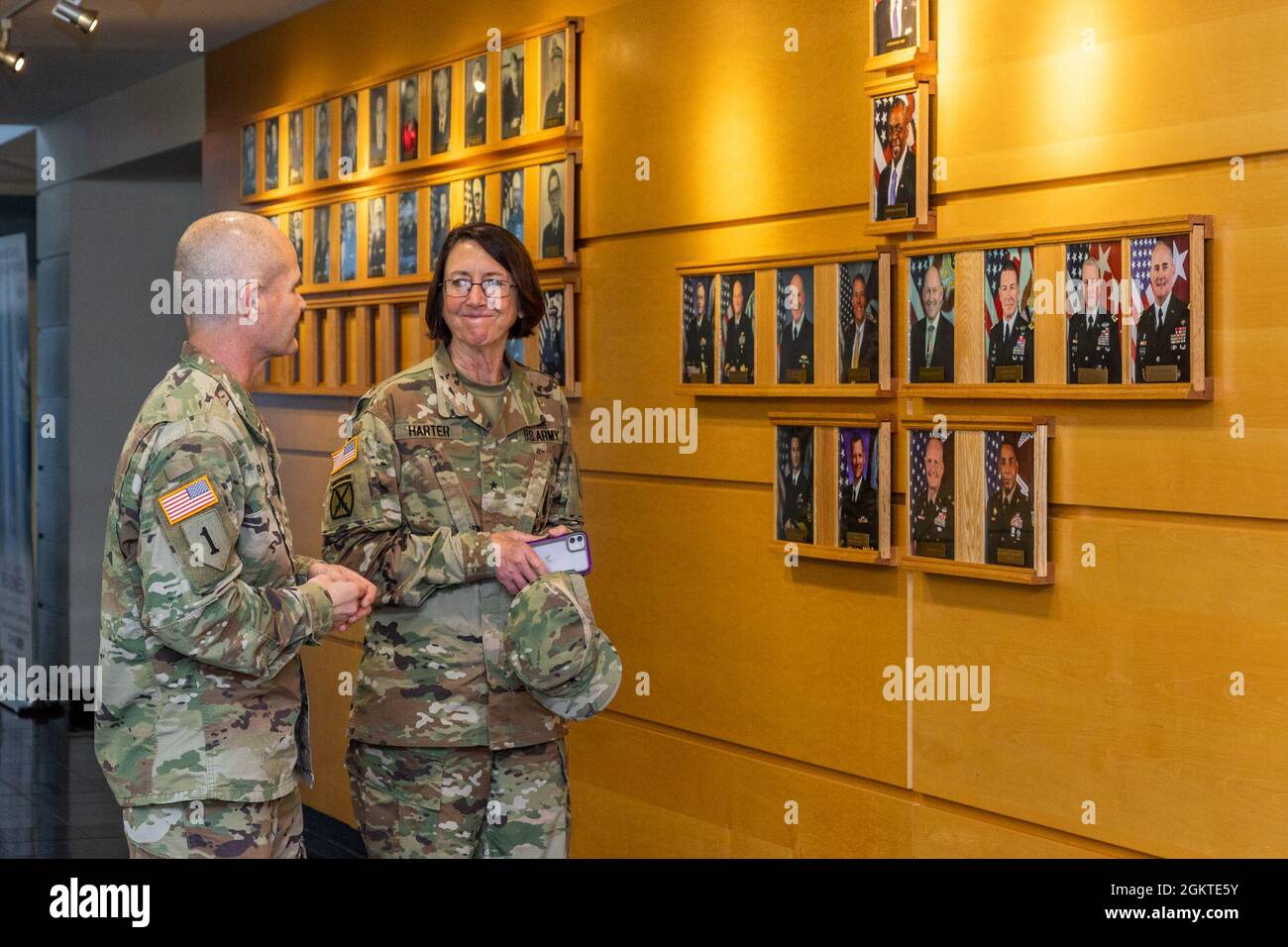 Brigadier General Wendy L. Harter (right) takes a moment with Col ...