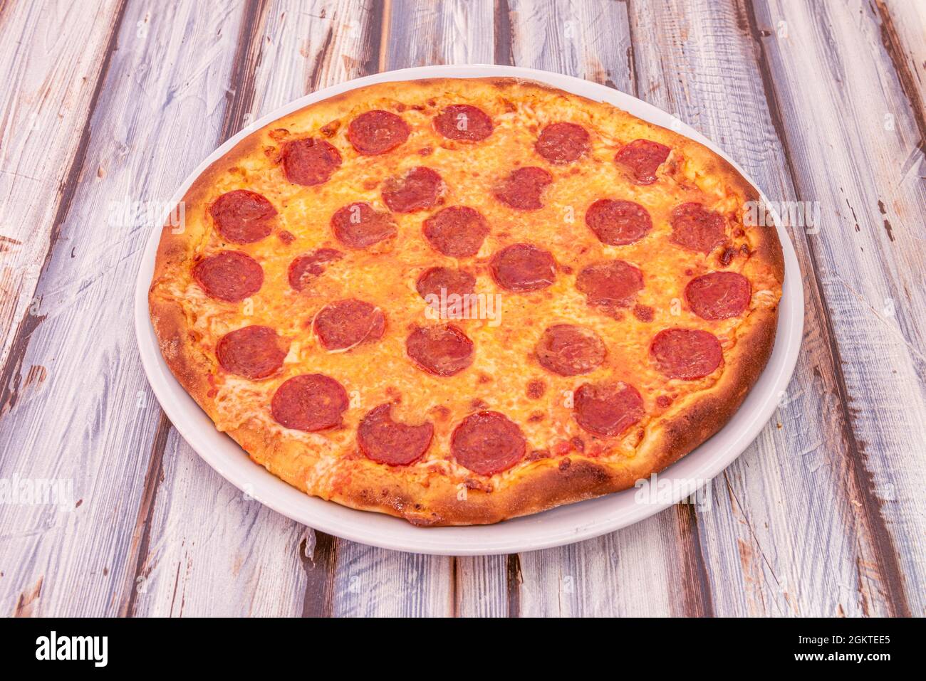 Large pepperoni pizza lots hi-res stock photography and images - Alamy