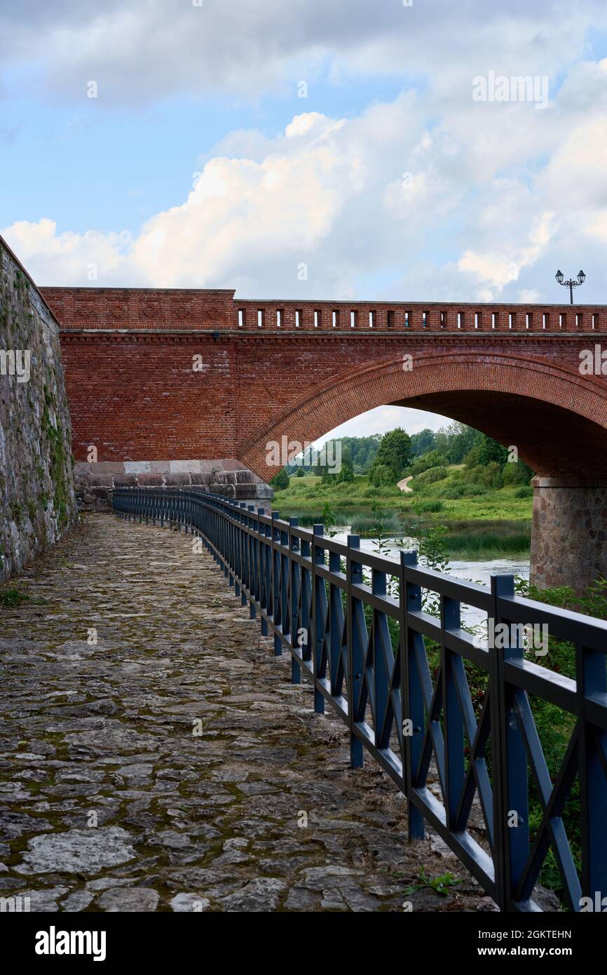 Pathway to the red bridge Stock Photo - Alamy