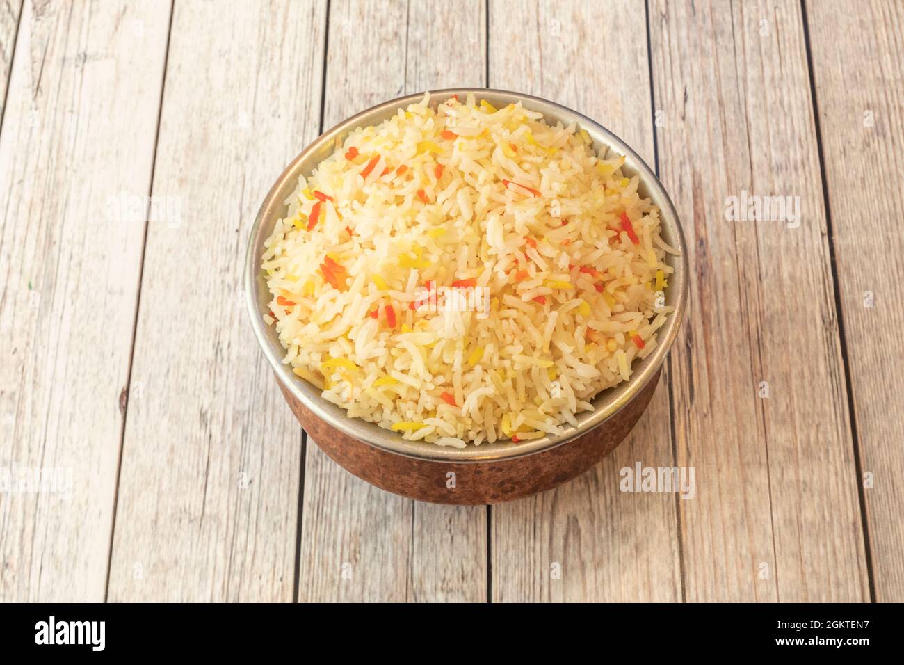 Pilau rice cooked by a Hindu chef and served in a traditional metal ...