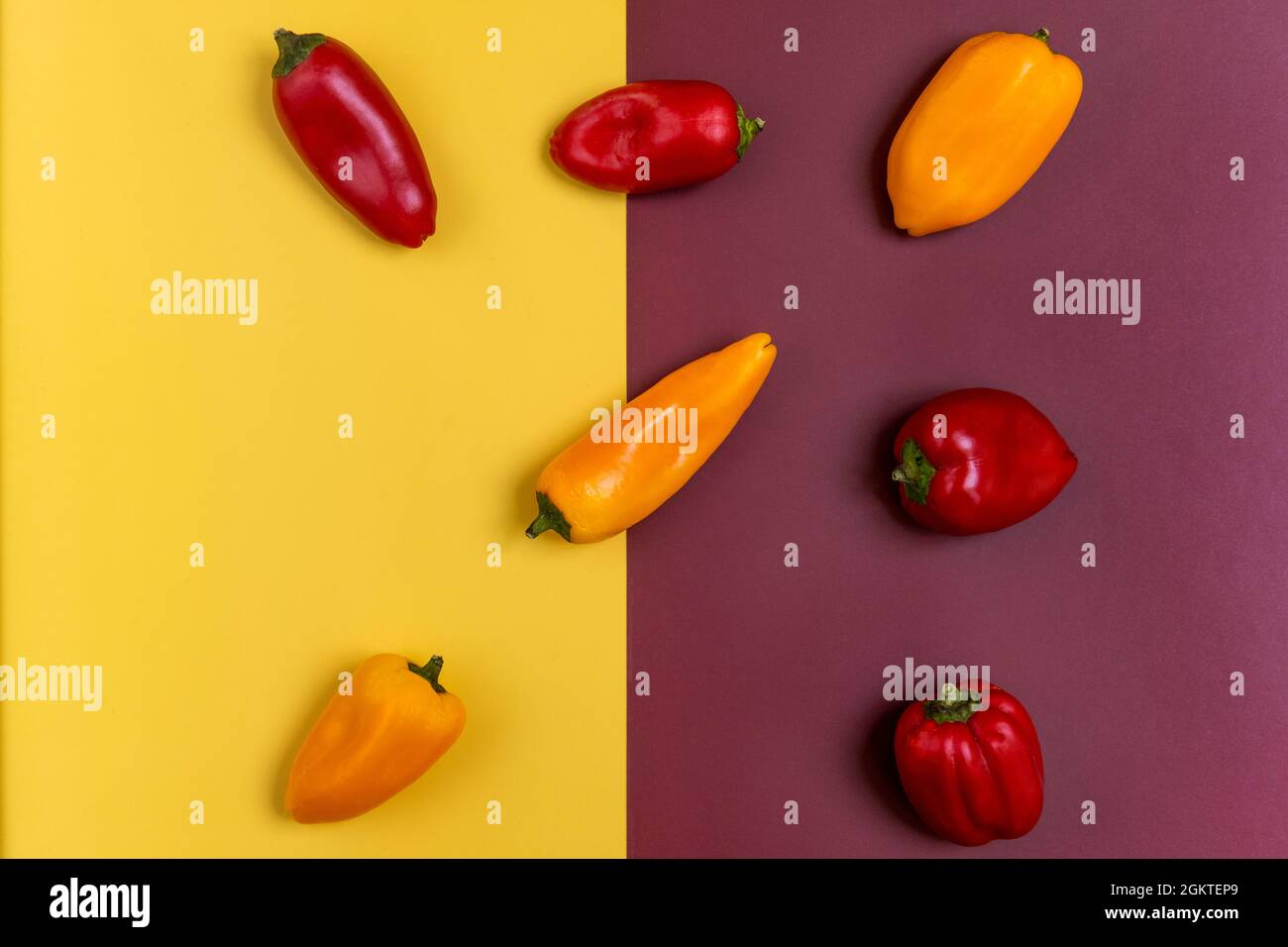 Abstract photography of red and yellow peppers with plain backgrounds ...