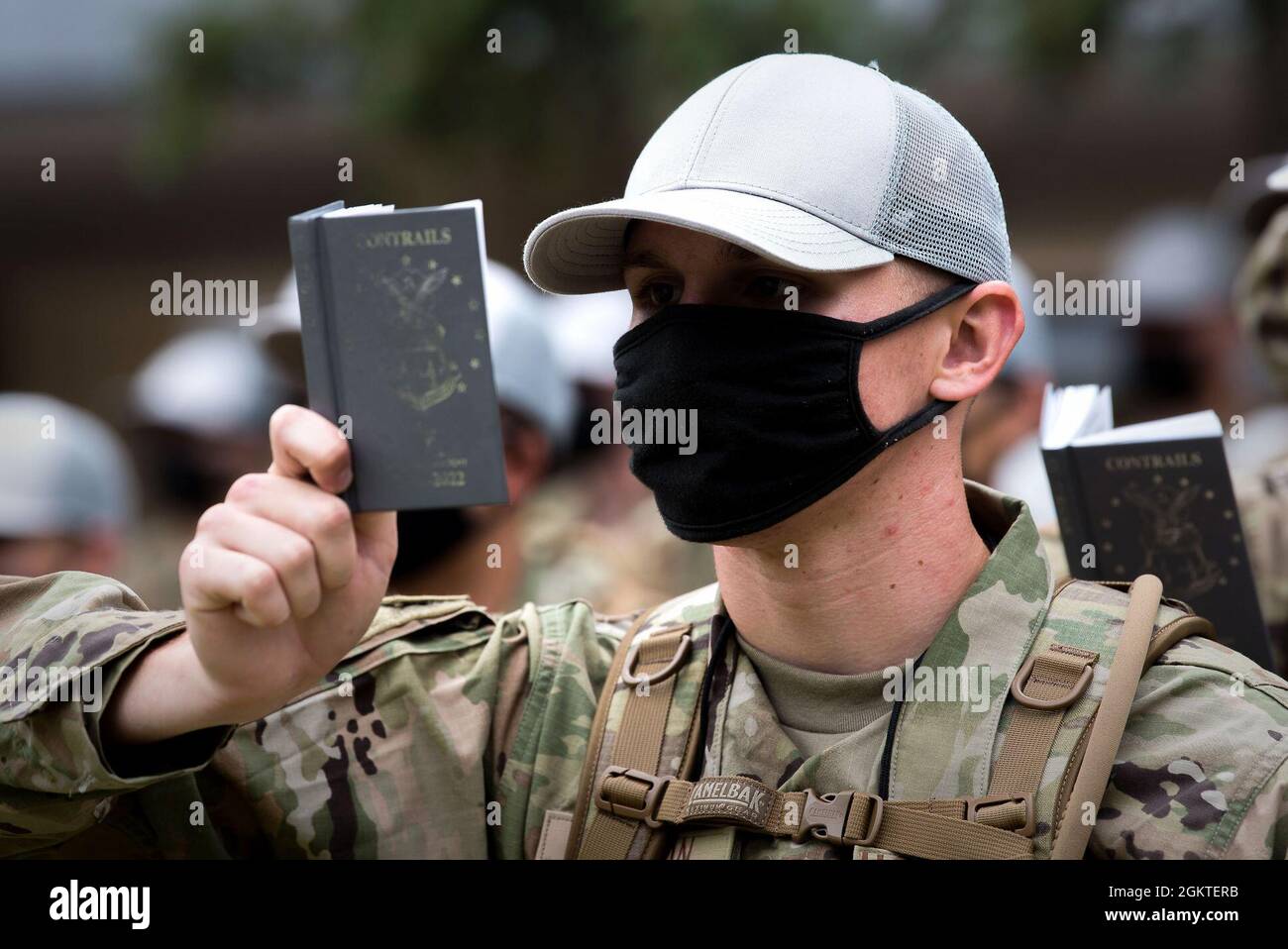 U.S. AIR FORCE ACADEMY, Colo. – An Academy basic cadet reads Contrails ...