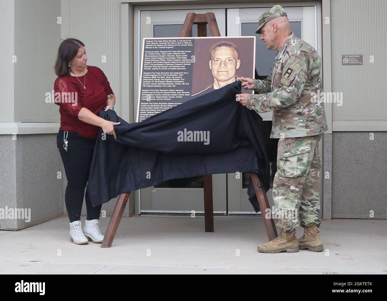 Tanya Shumate (left), wife of Sgt. 1st Class Wavie Shumate, who was ...