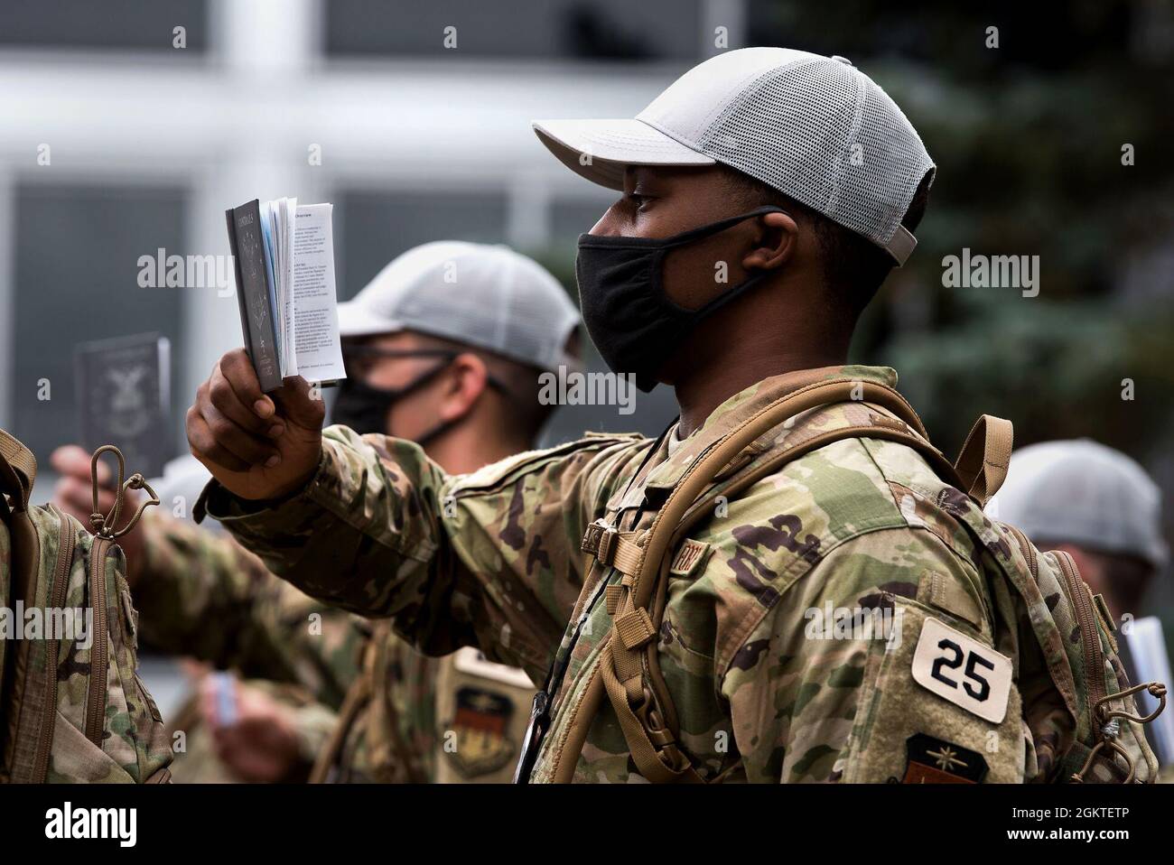 U.S. AIR FORCE ACADEMY, Colo. – An Academy basic cadet reads Contrails ...