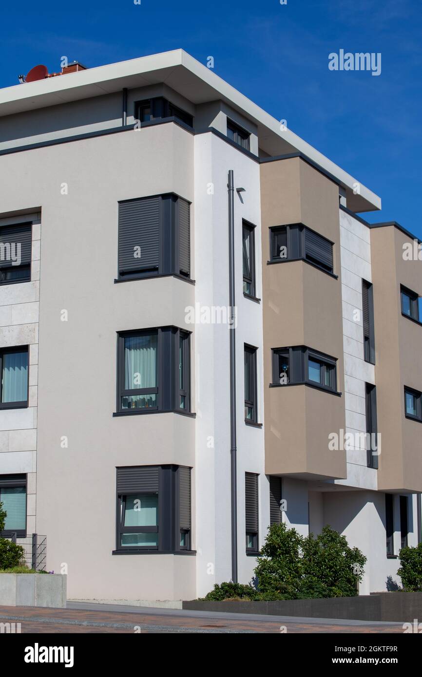 Modern apartment building in urban style Stock Photo - Alamy