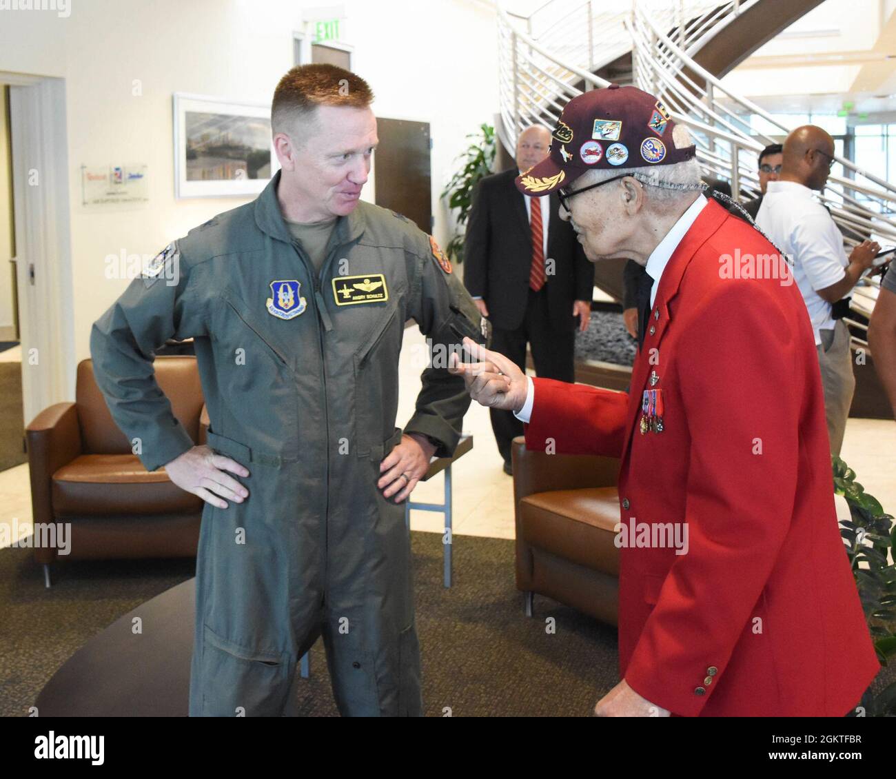 Brig. Gen. Mike Schultz, the 442d Fighter Wing commander, speaks with ...