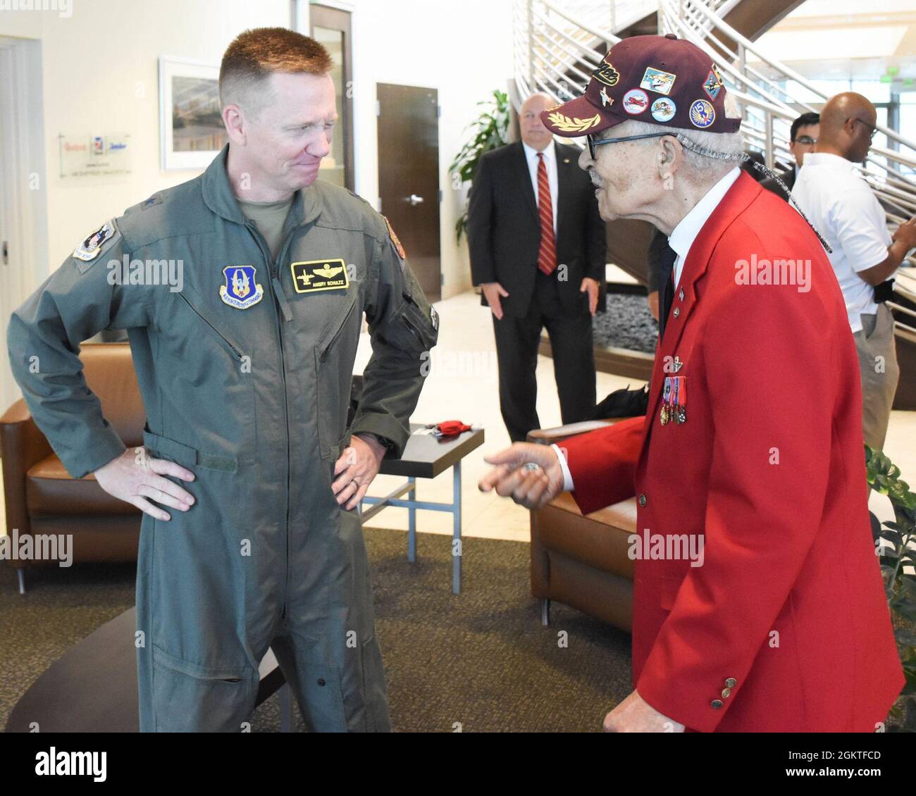 Brig. Gen. Mike Schultz, the 442d Fighter Wing commander, speaks with ...