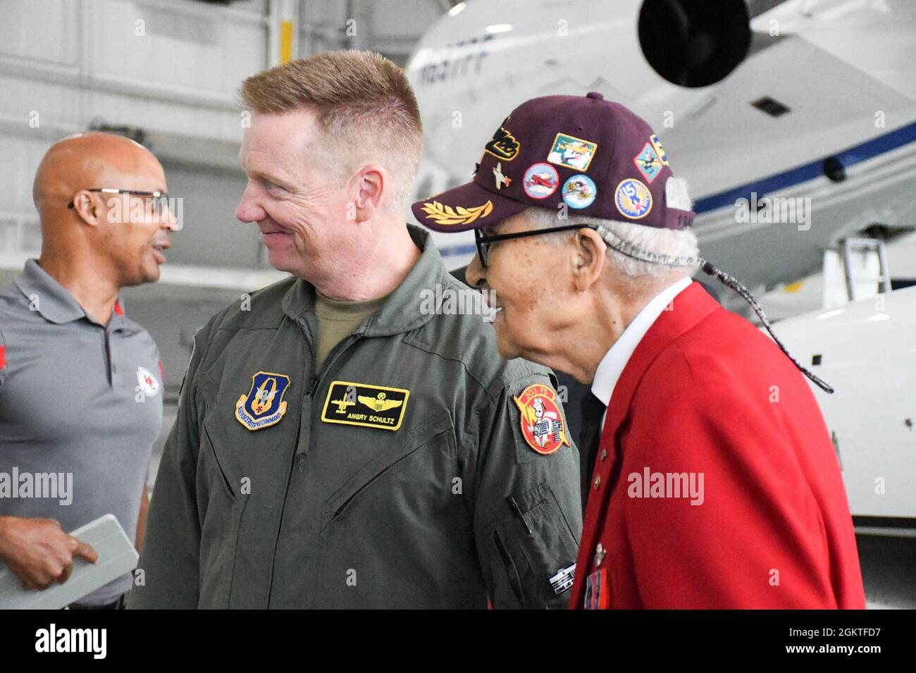 Brig. Gen. Mike Schultz, the 442d Fighter Wing commander, speaks with ...