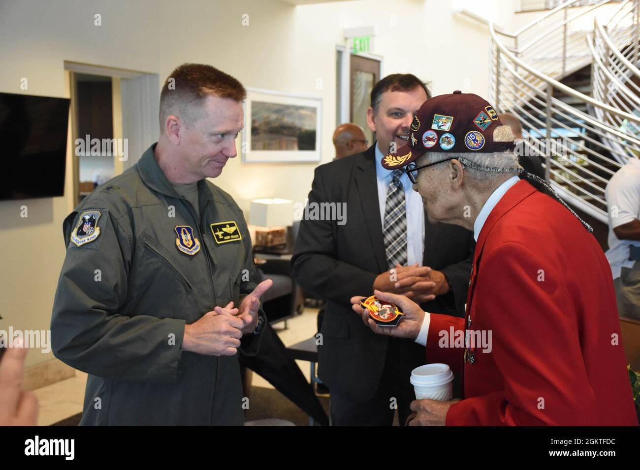 Brig. Gen. Mike Schultz, the 442d Fighter Wing commander, speaks with ...