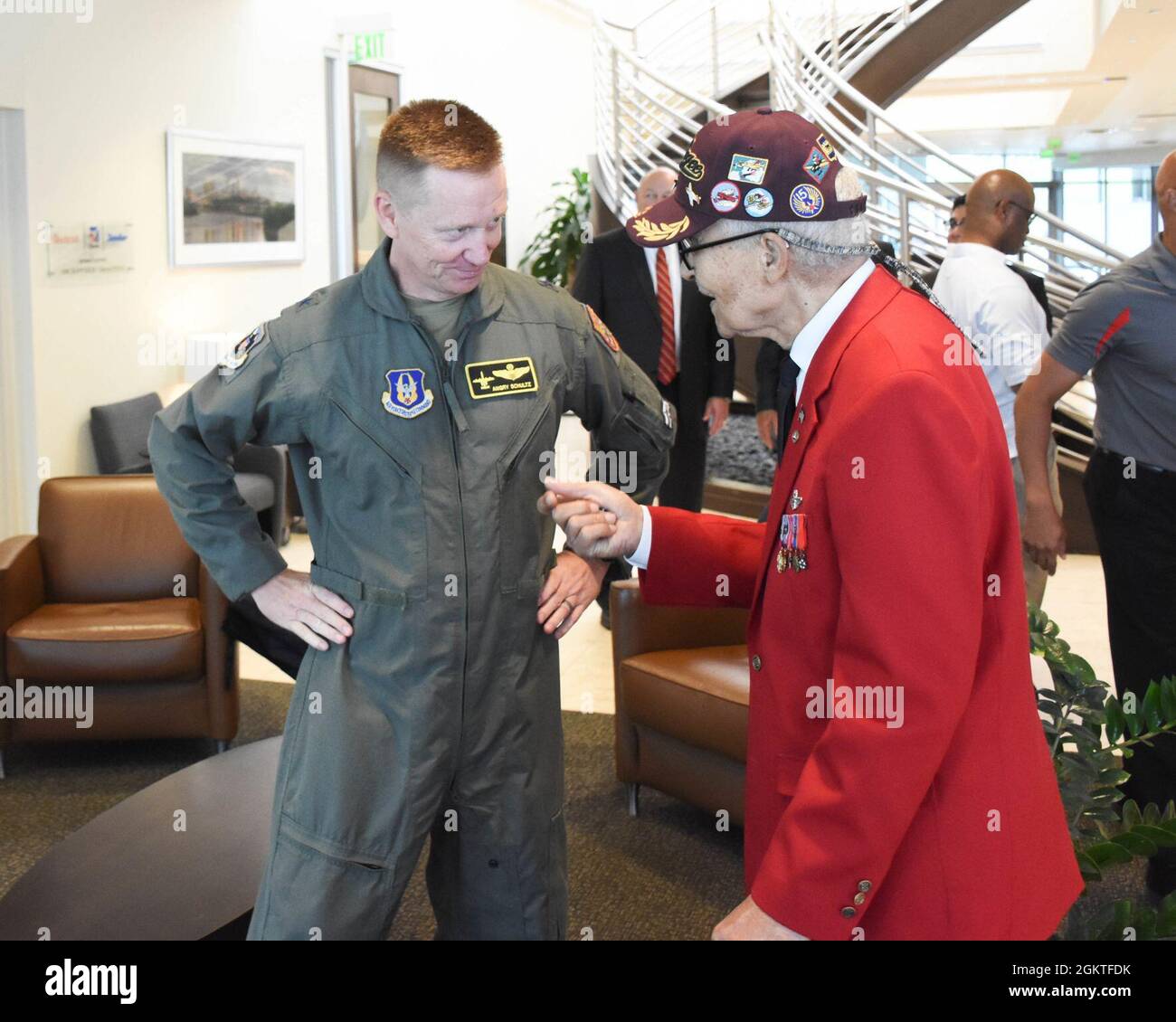 Brig. Gen. Mike Schultz, the 442d Fighter Wing commander, speaks with ...