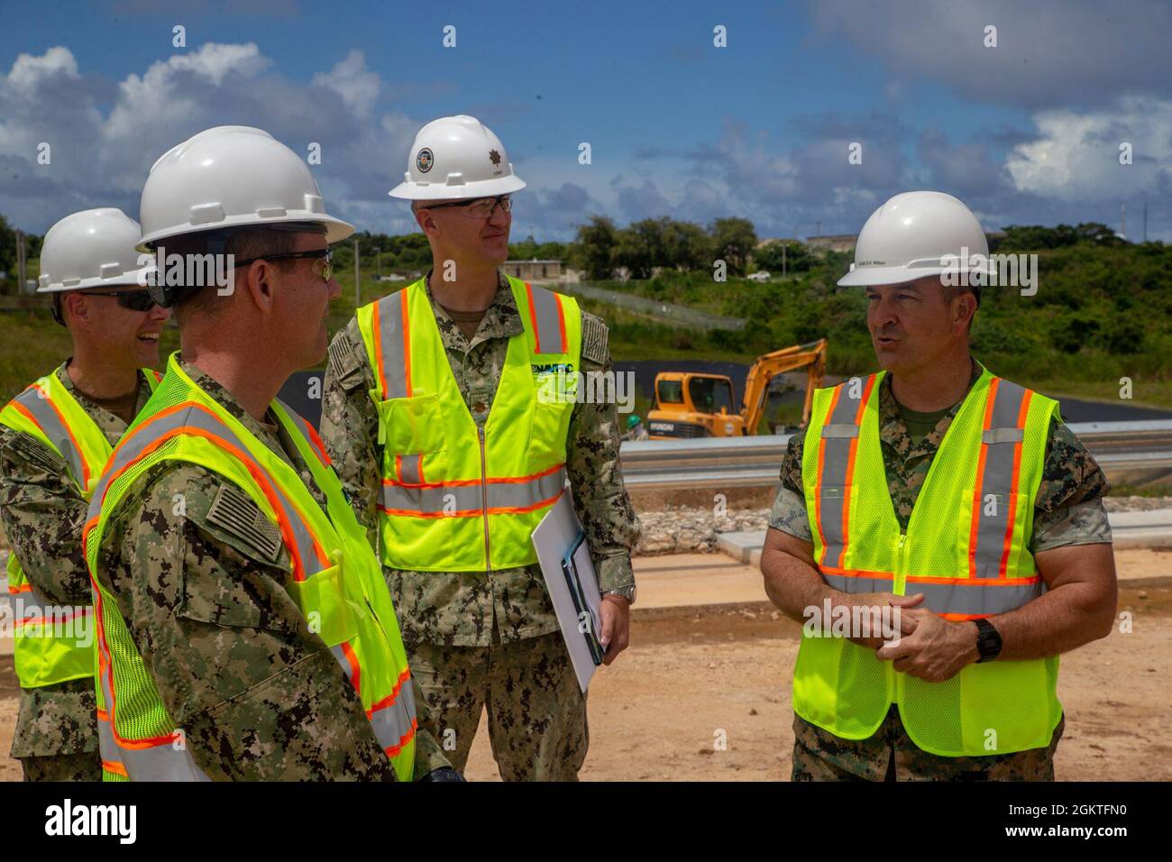 Lt. Col. Tate Buntz, the Marine Corps Base (MCB) Camp Blaz Operations Officer, right, briefs ...