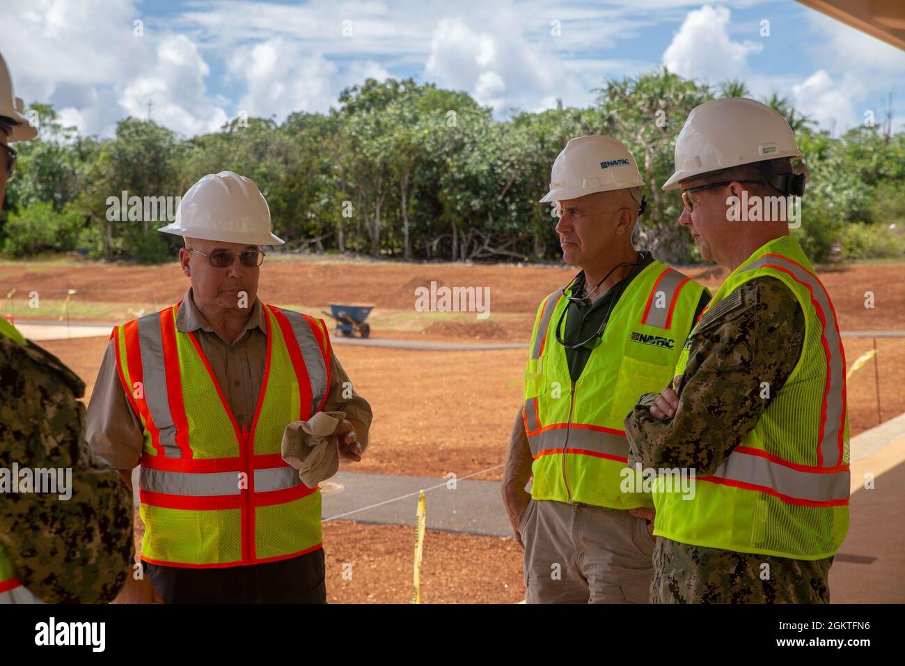 Dave Bednarcik, the Marine Corps Base (MCB) Camp Blaz Range Control Officer, left, briefs U.S ...