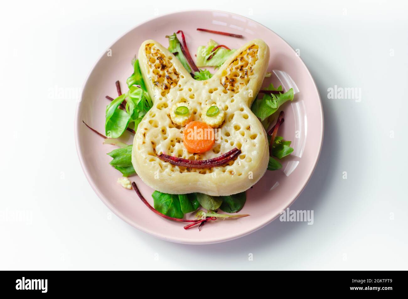 Funny and nice bunny shaped crumpets served with mix fresh vegetables ...