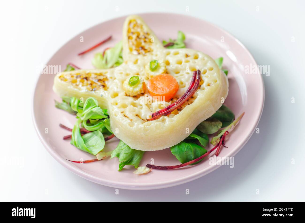 Funny and nice bunny shaped crumpets served with mix fresh vegetables ...