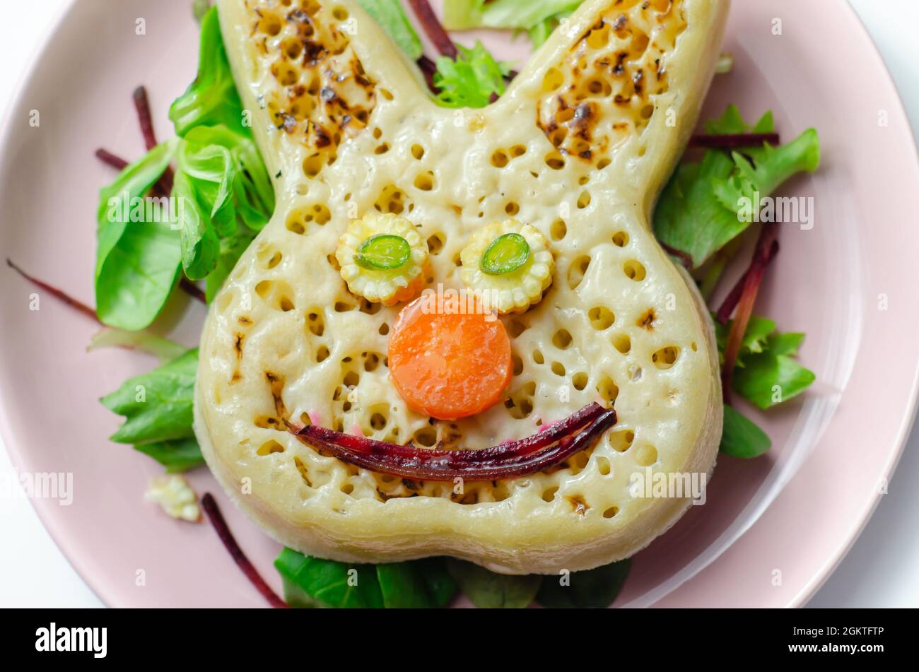 Funny and nice bunny shaped crumpets served with mix fresh vegetables ...