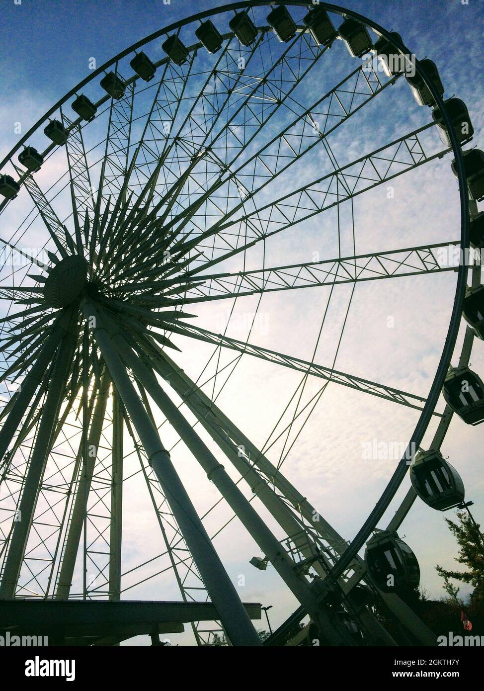 Low angle of the Ferris wheel in the morning Stock Photo - Alamy