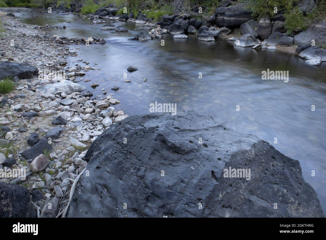 Landscape of a running river surface Stock Photo - Alamy