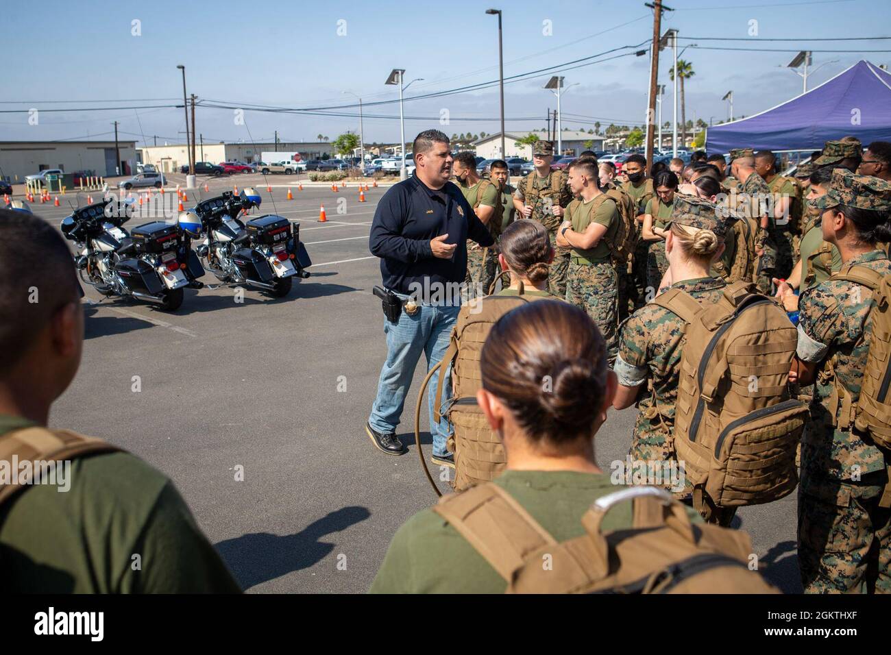 Jake Sanchez, a California Highway patrolman, speaks to the Marines of ...