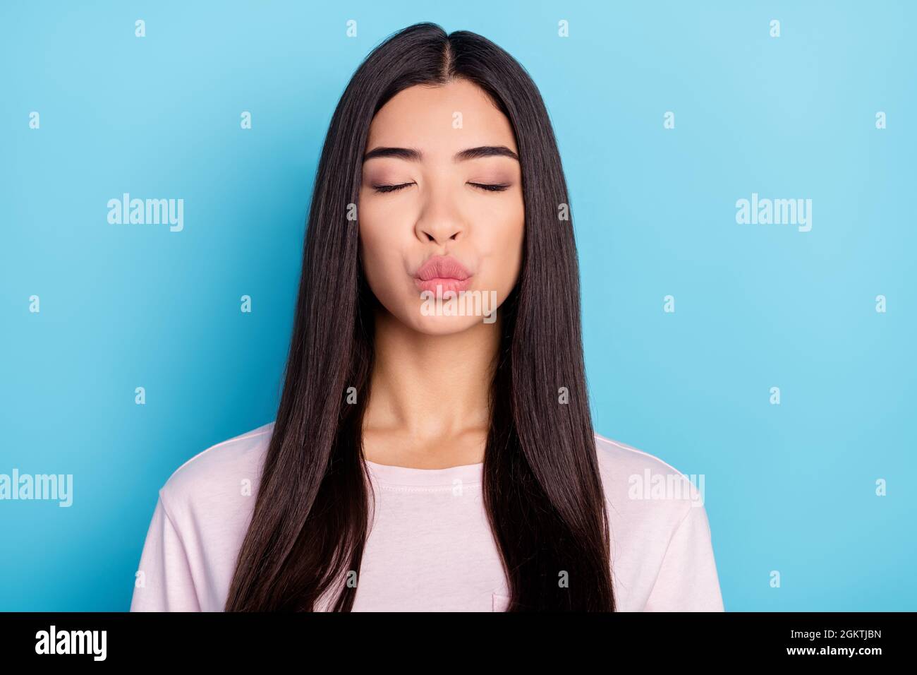 Portrait of attractive amorous dreamy affectionate girl sending air ...