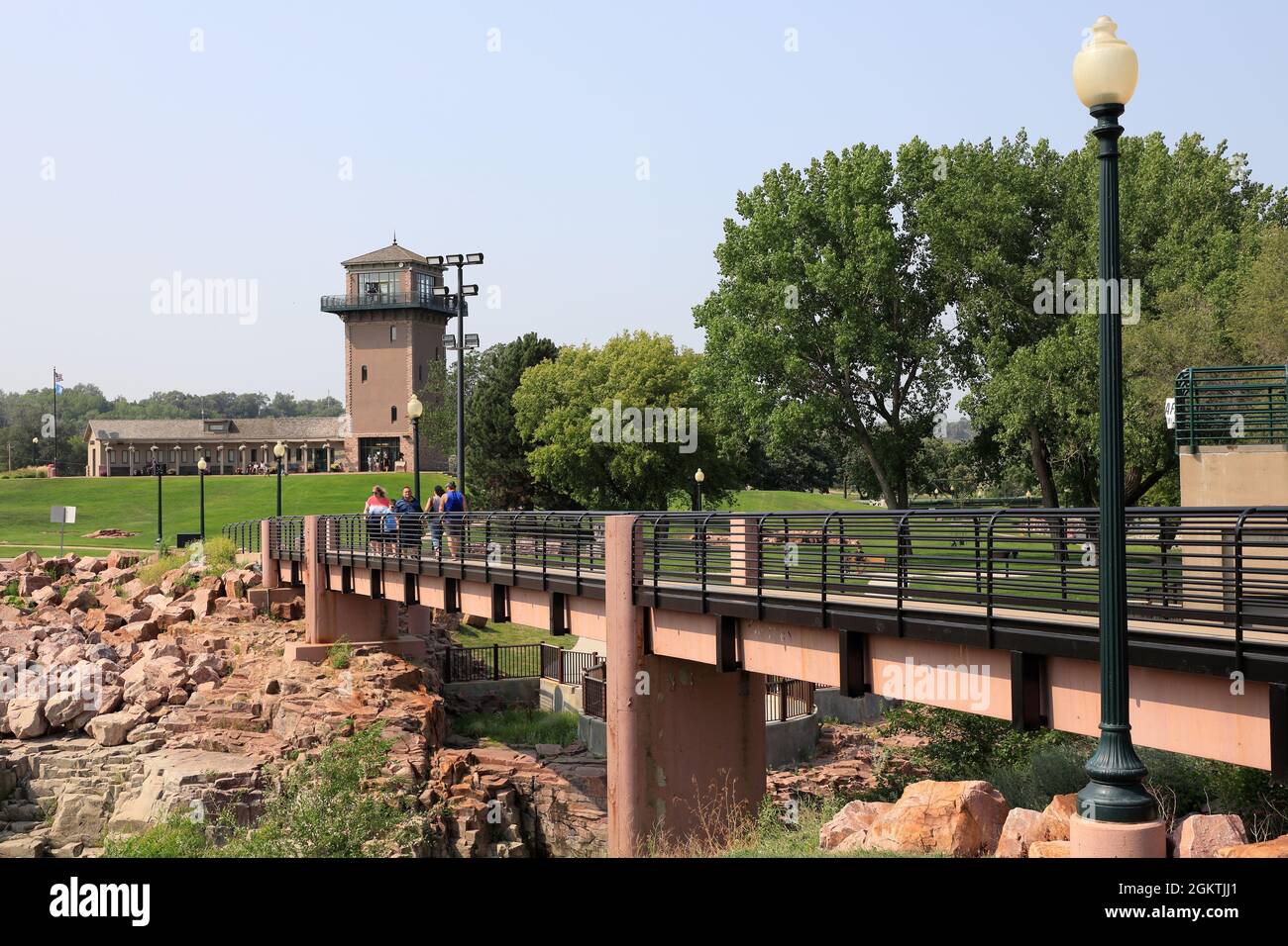 Bridge over Sioux Falls with observation tower in background in Falls ...