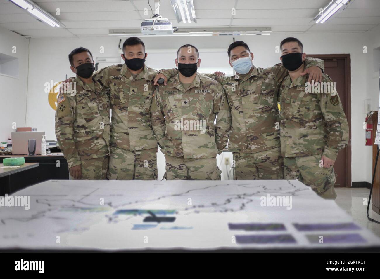 From left, Sgt. Randy Ngirmekur, Spc. Ken Clark, Spc. Avery Tyquienco ...