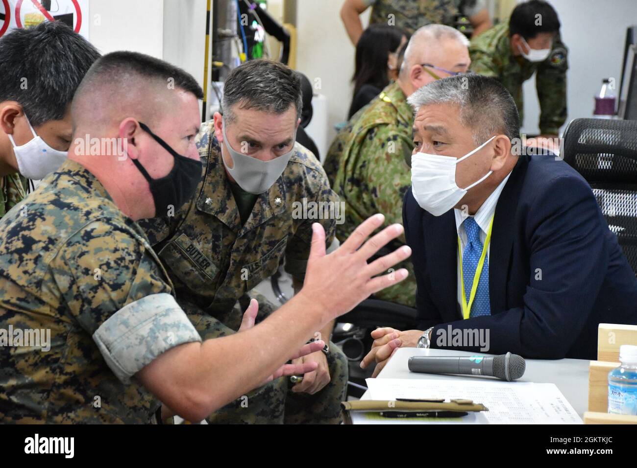 Maj. Gen. James Bierman, left, 3d Marine Division commanding general ...