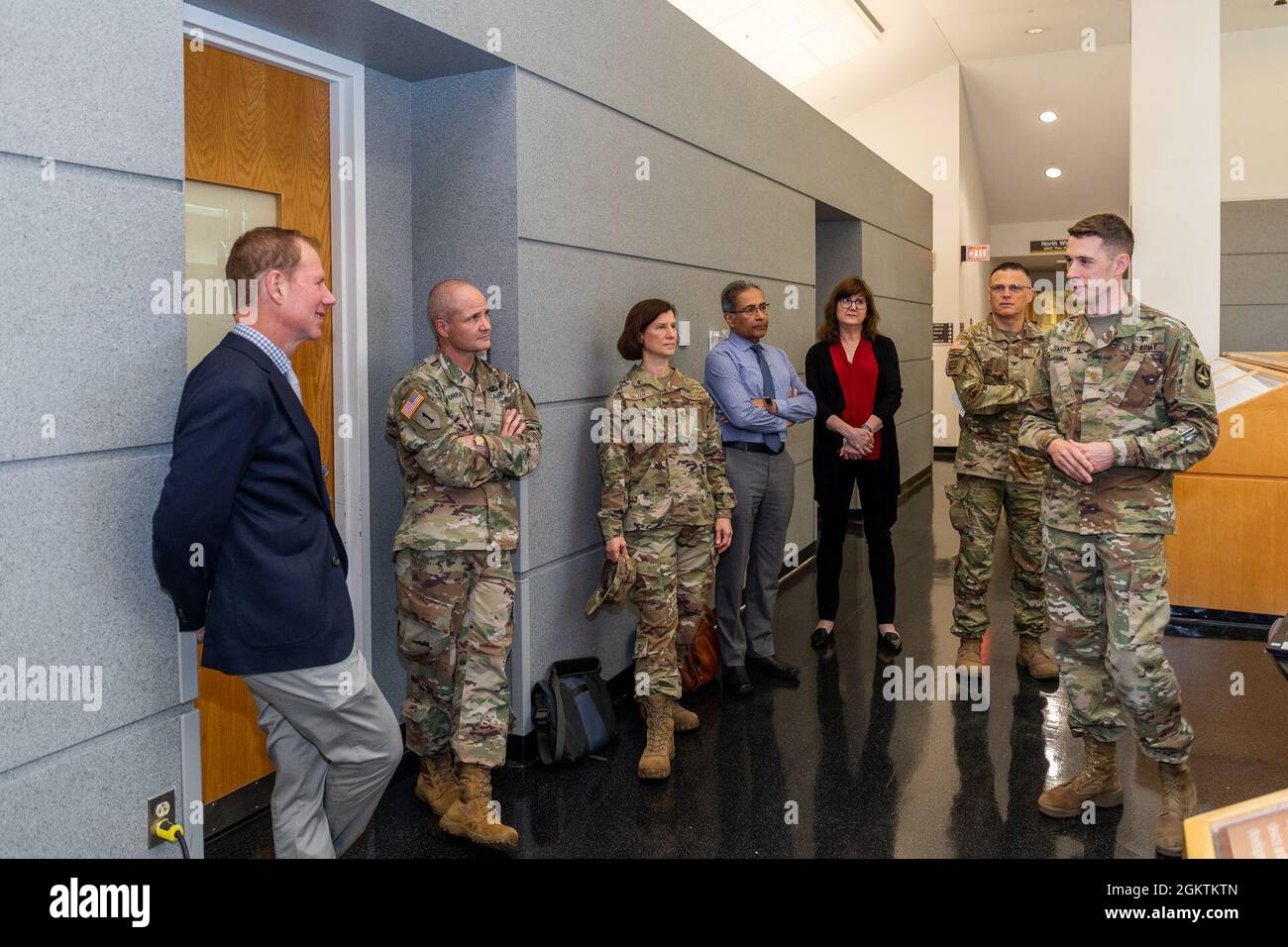Major Carl Smith (right) briefs Captain Eric Elster (left) on the ...