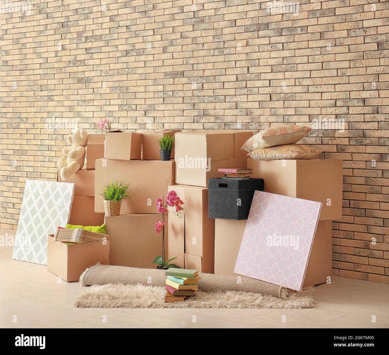 Moving boxes in light room Stock Photo - Alamy