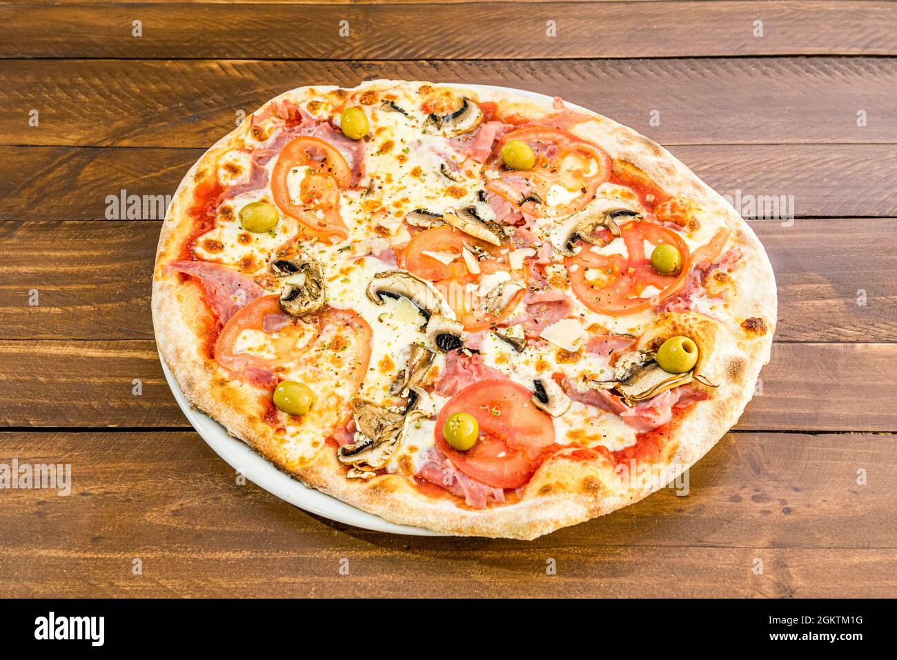 Delicious thin crust pizza with mushrooms, lots of melted cheese ...