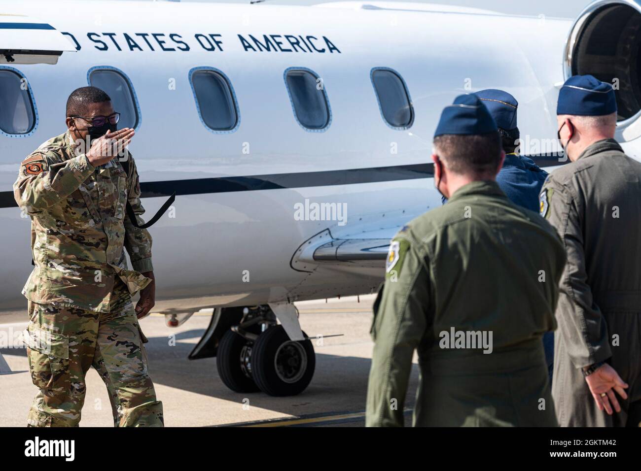 Maj. Gen. Randall Reed (left), Third Air Force commander, salutes ...