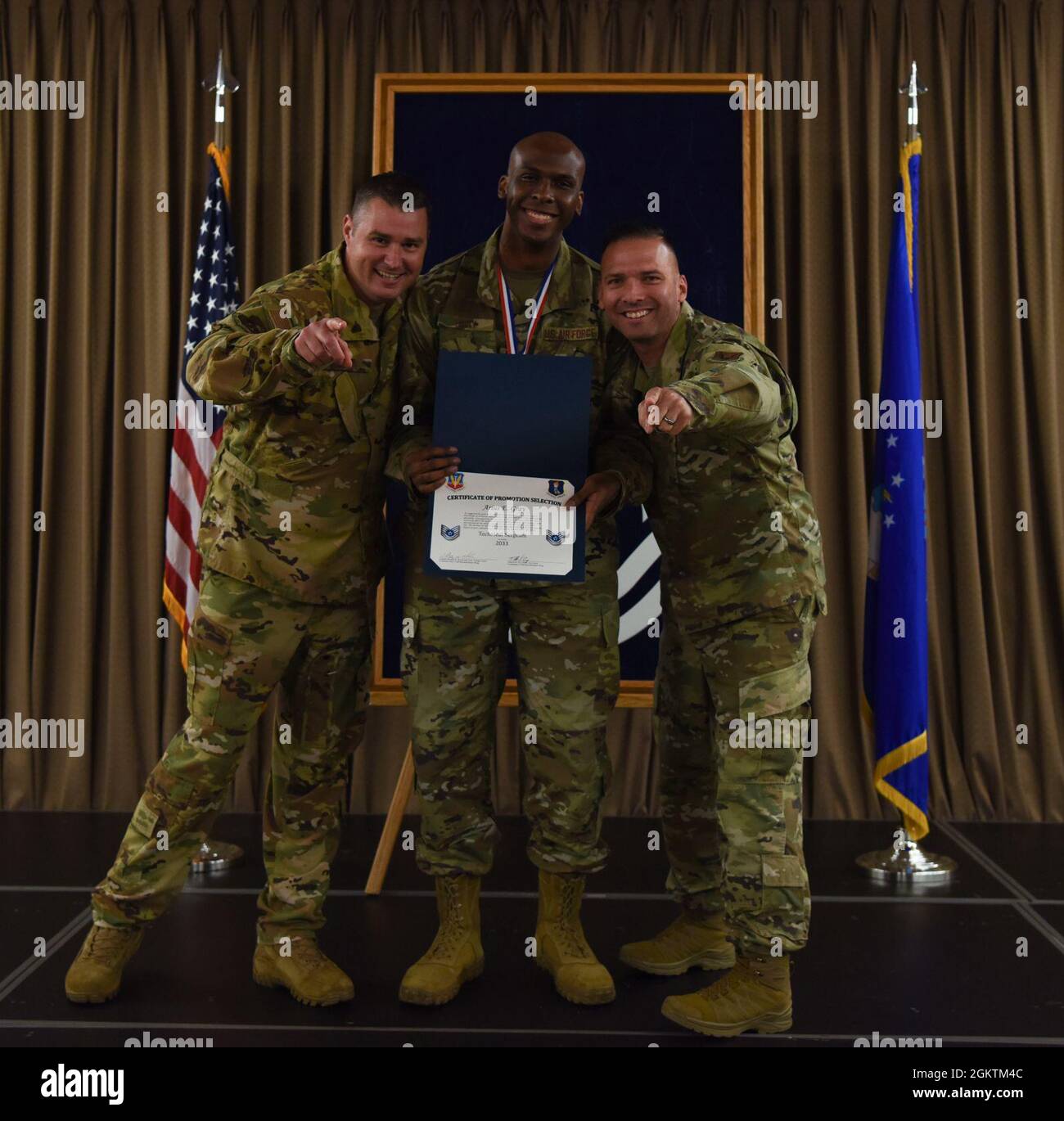 A Tech. Sgt. select from the 319th Operations Group pose for a photo ...