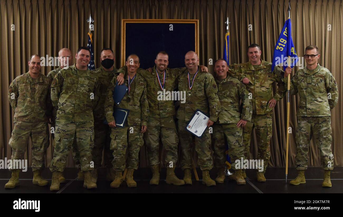 Tech. Sgt. selects from the 319th Aircraft Maintenance Squadron pose ...