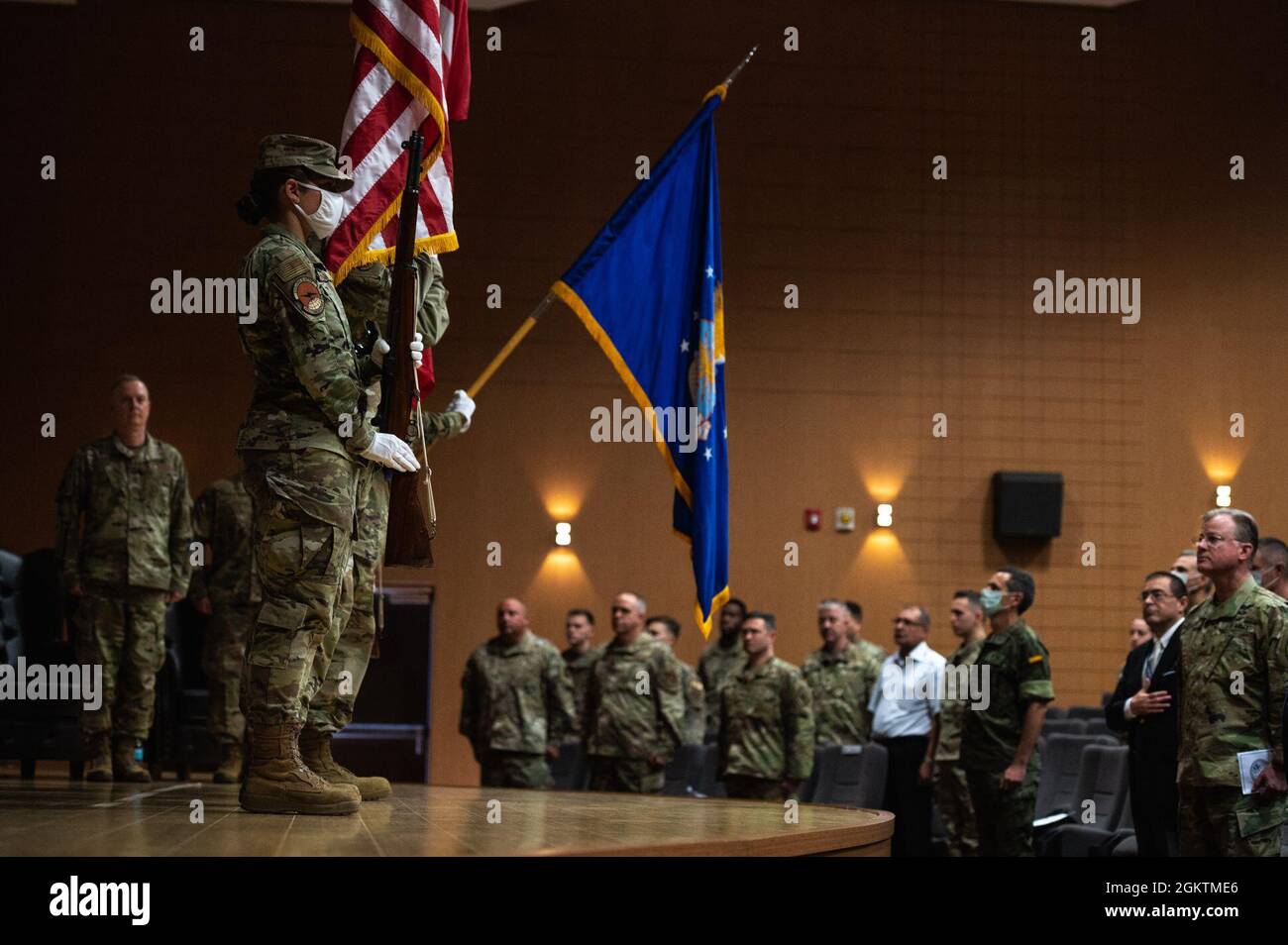 The 39th Air Base Wing Honor Guard presents the colors during a change ...