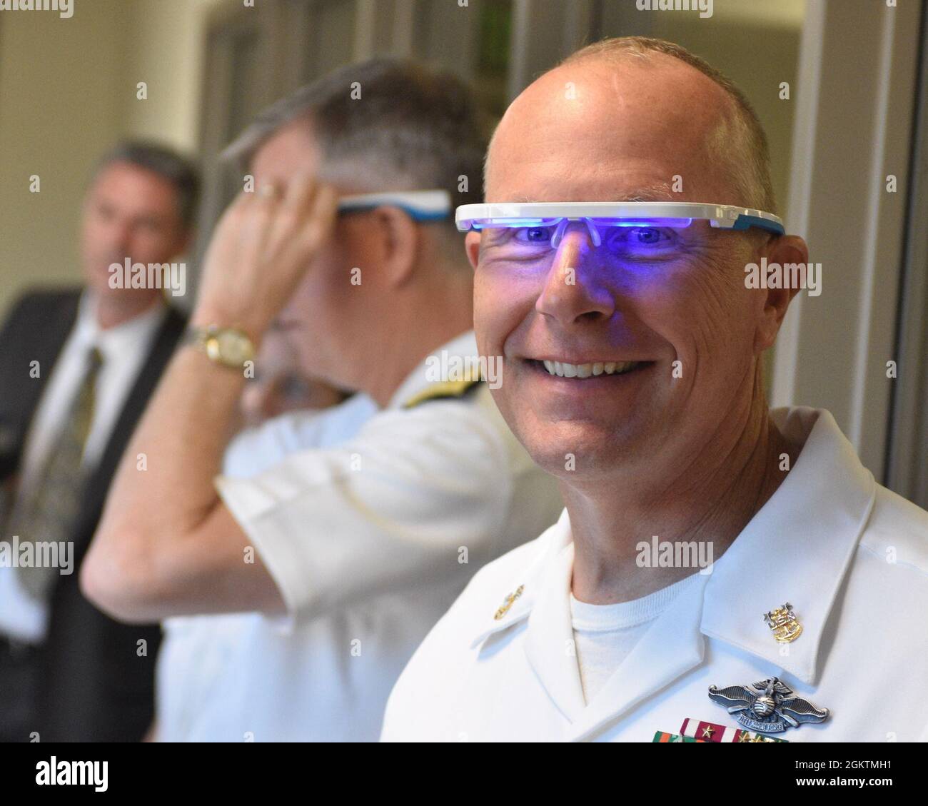 Navy Medicine Force Master Chief Michael Roberts tries out a pair of ...