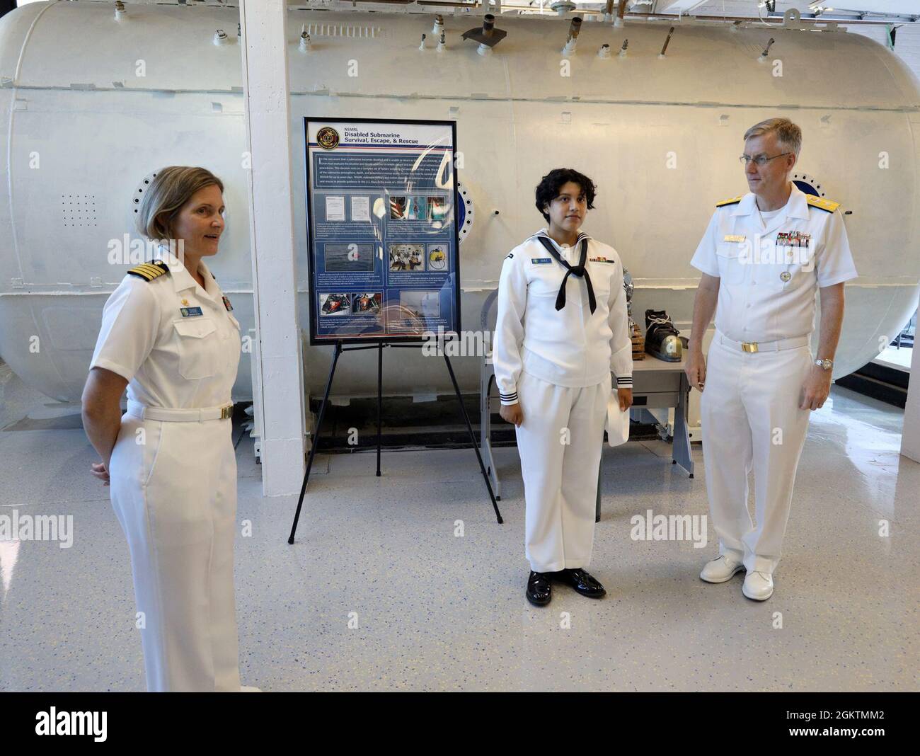 Rear Adm. Tim Weber, Commander, Naval Medical Forces Pacific, presents ...