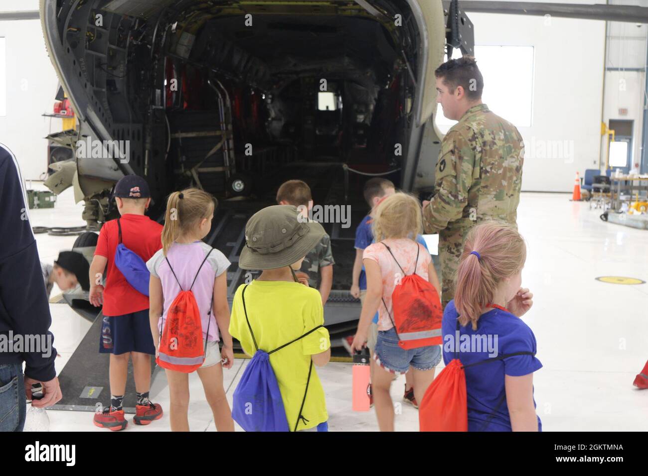 A Montana National Guard soldiers takes campers on a tour of the Helena ...