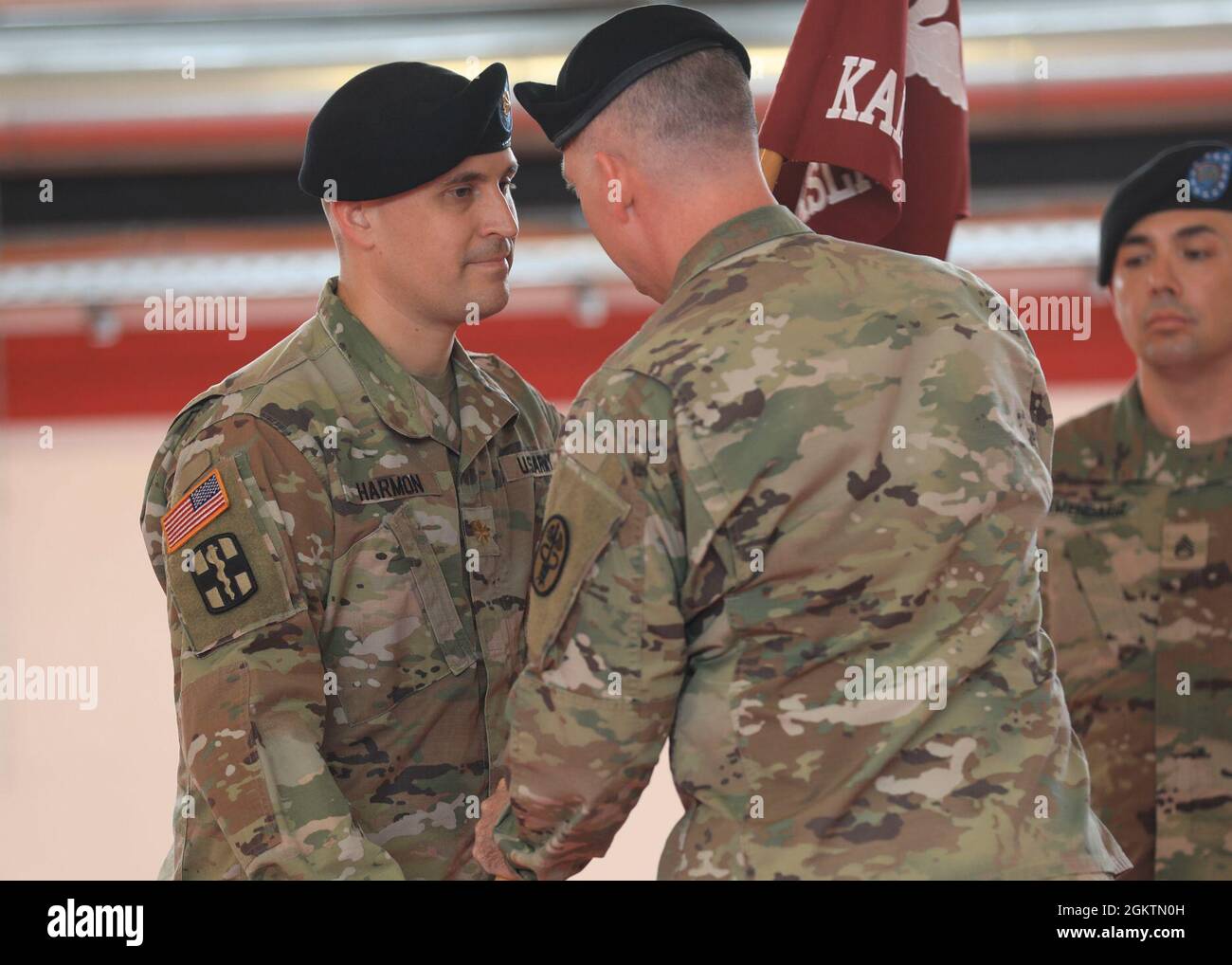 (From left) U.S. Army Maj. Stephen Harmon receives the unit guidon from ...