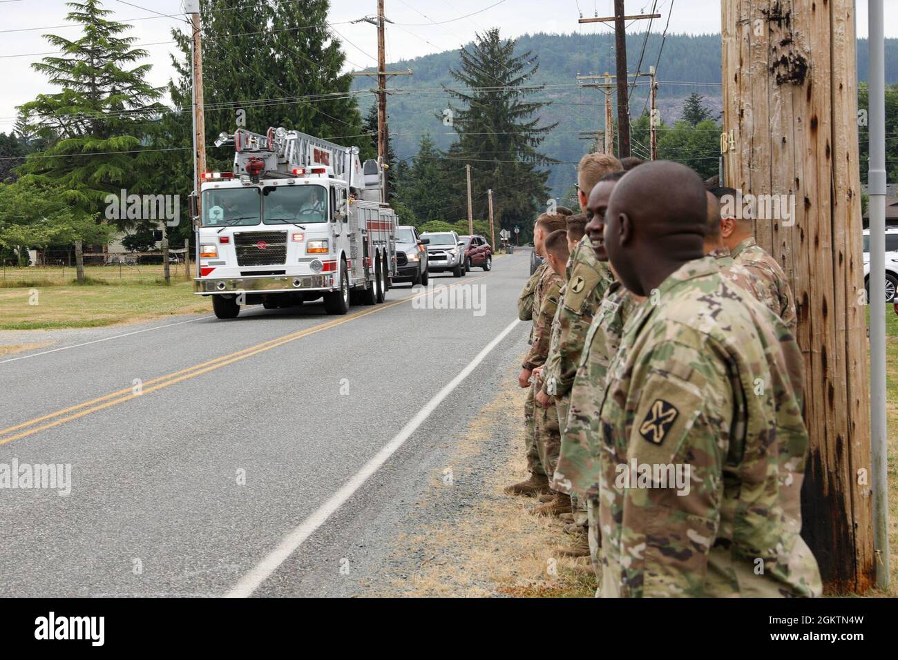 An engine from the Sedro-Woolley Fire Department drives by the Helping ...