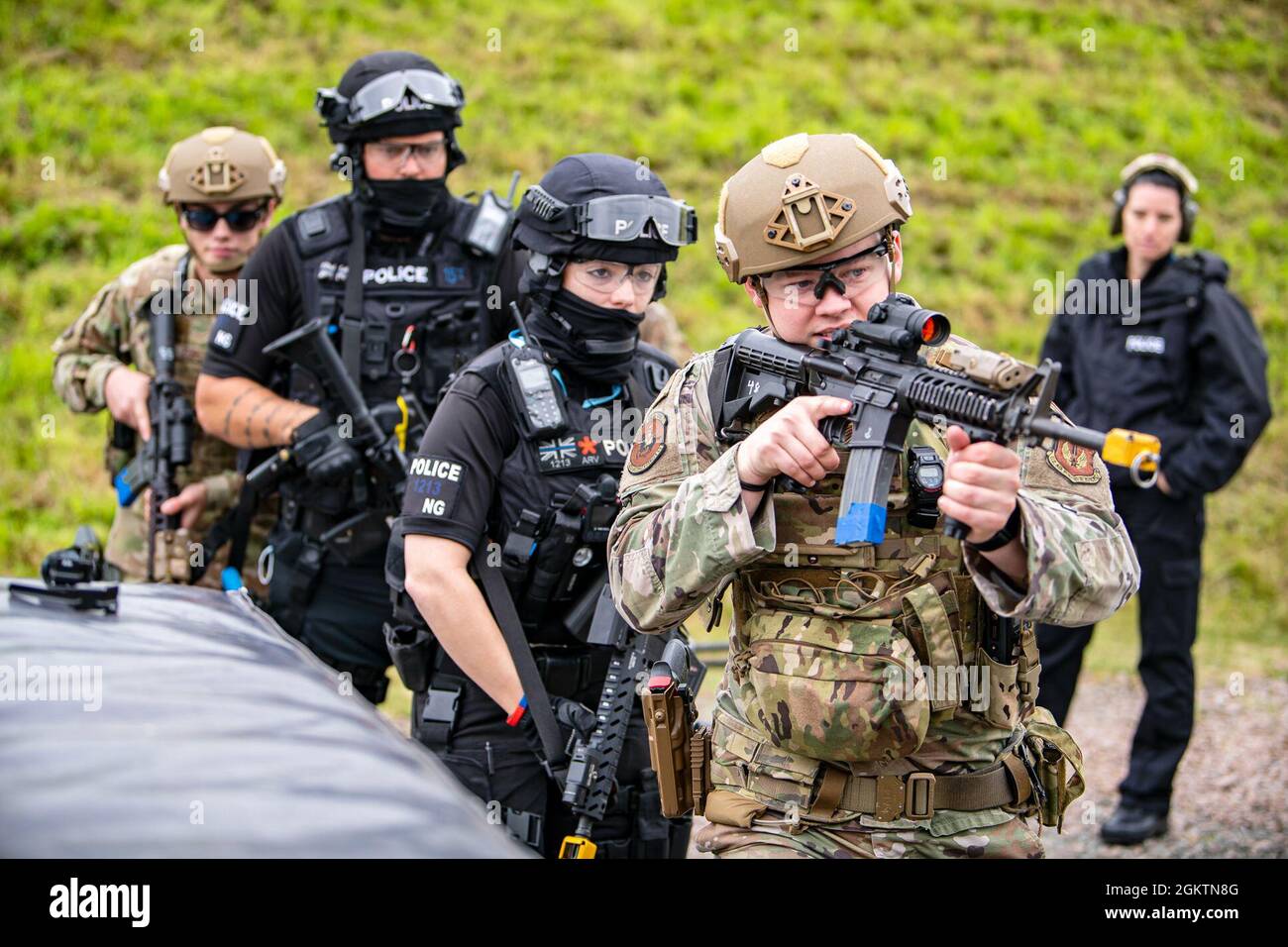 Airmen from the 422nd Security Forces Squadron, along with police ...