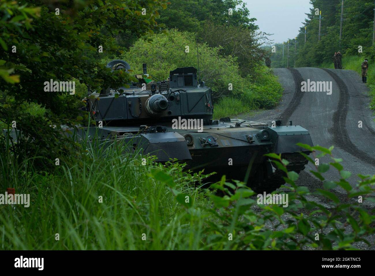 A Japan Ground Self-Defense Force Type 90 Main Battle Tank takes part ...