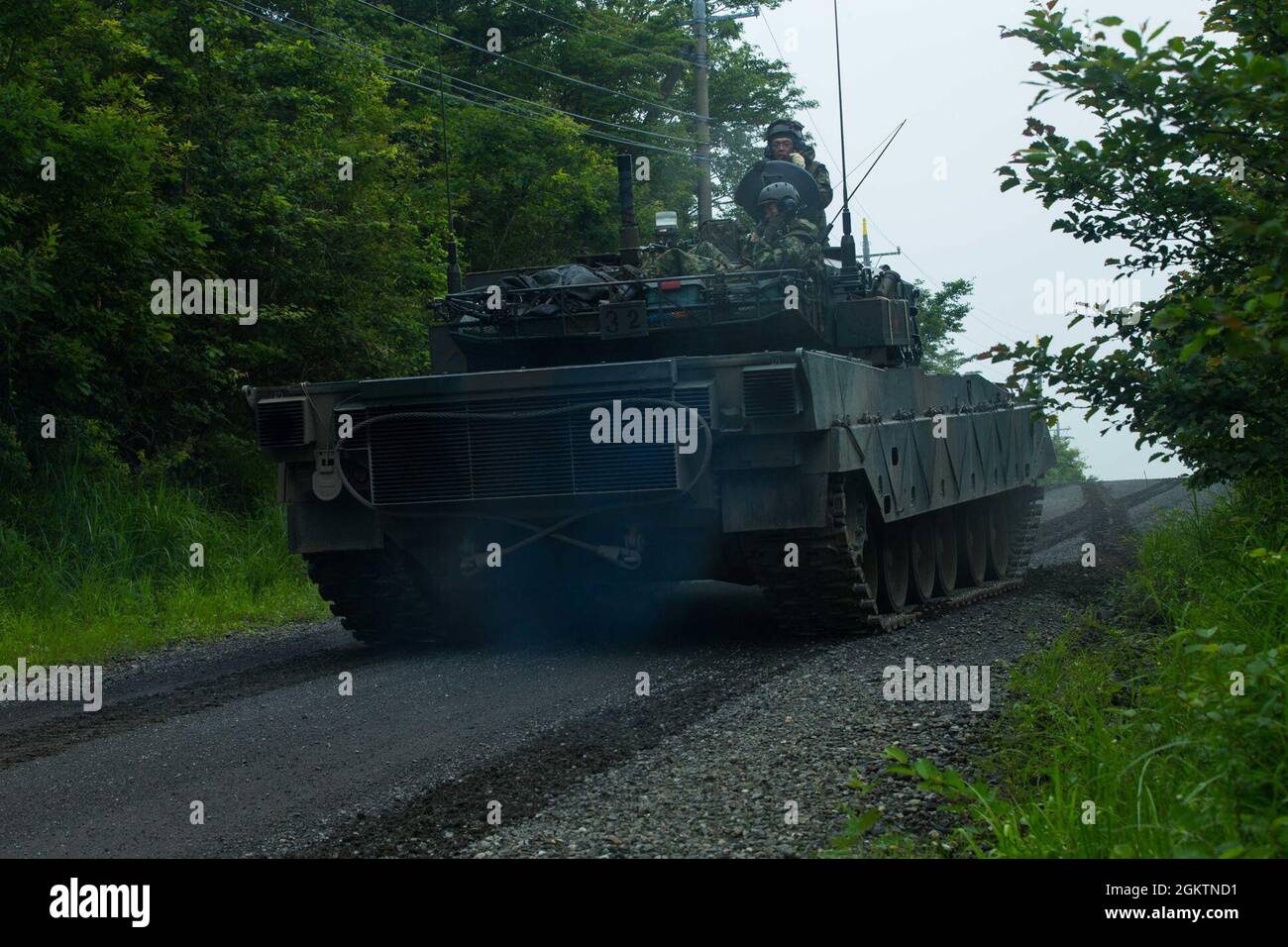 A Japan Ground Self-Defense Force Type 90 Main Battle Tank moves ...