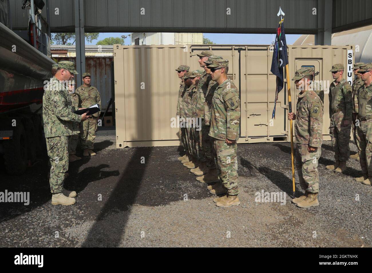U.S. Coast Guard Cmdr. Benjamin Lehrfeld, commander of Task Group 68.6 ...