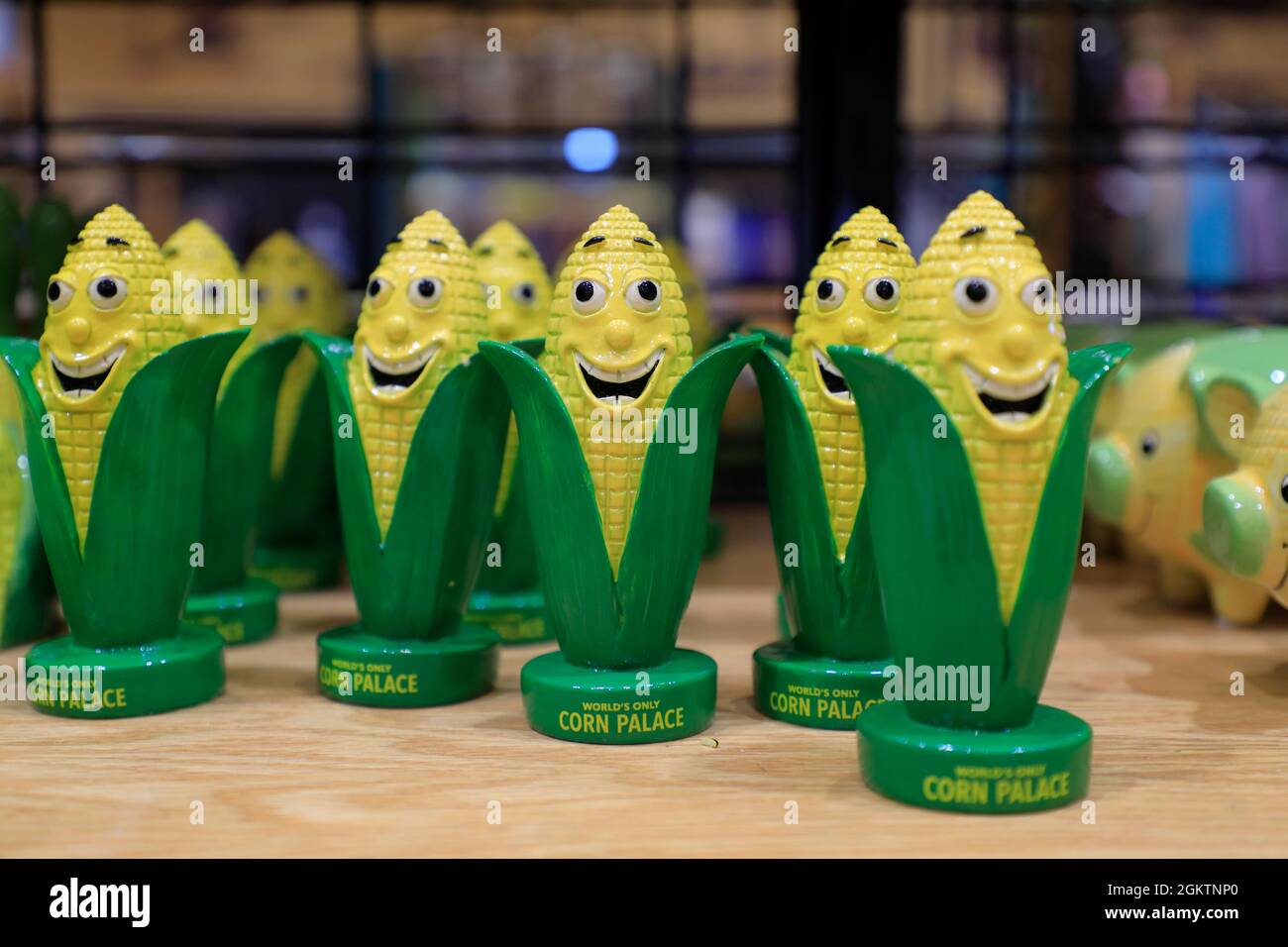 Plastic human faced corns with the world's only corn palace sign for ...