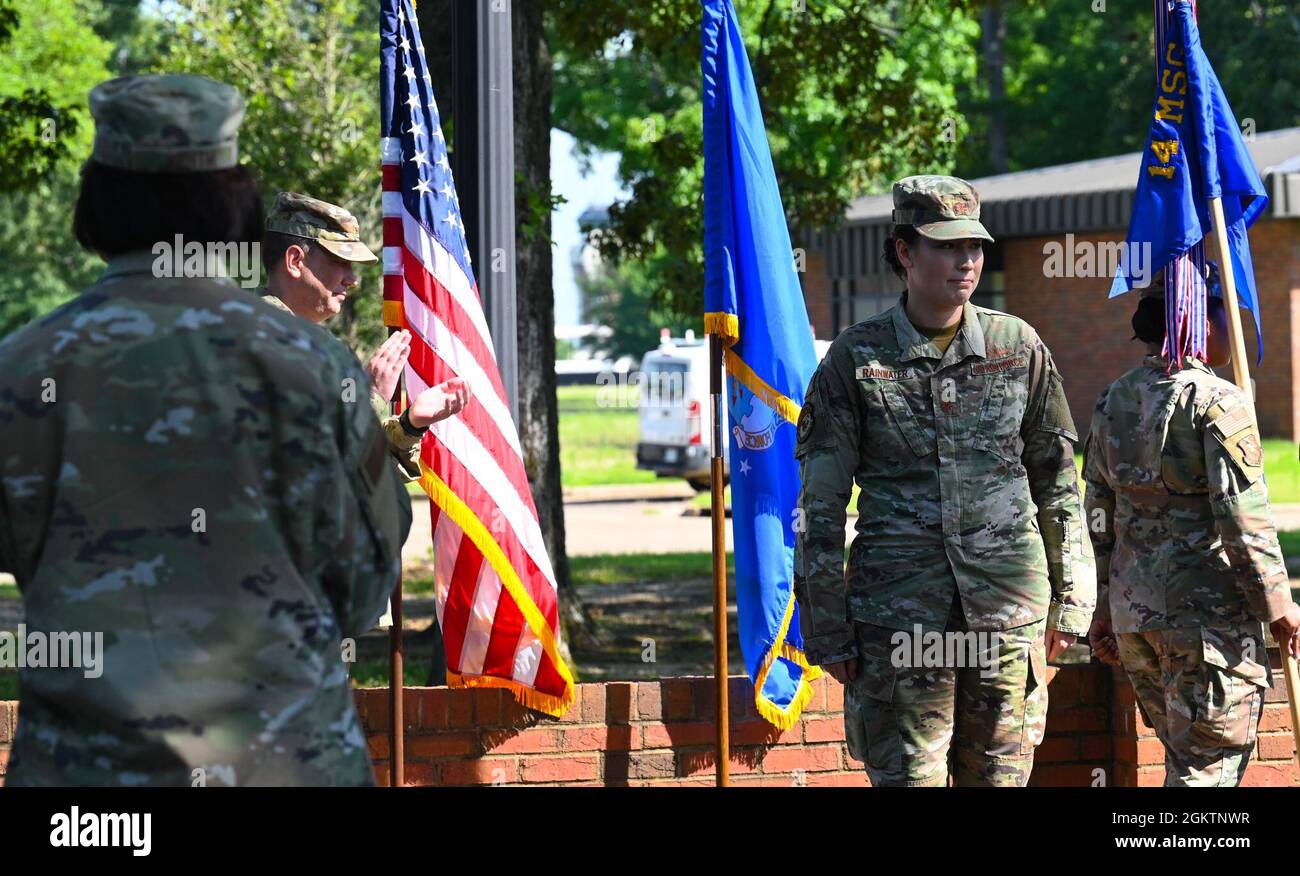 U.S. Air Force Maj. Elizabeth Rainwater, stands at attention as she is ...
