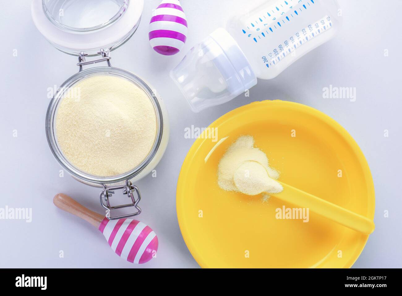 Composition with milk formula and baby bottle on white background Stock ...