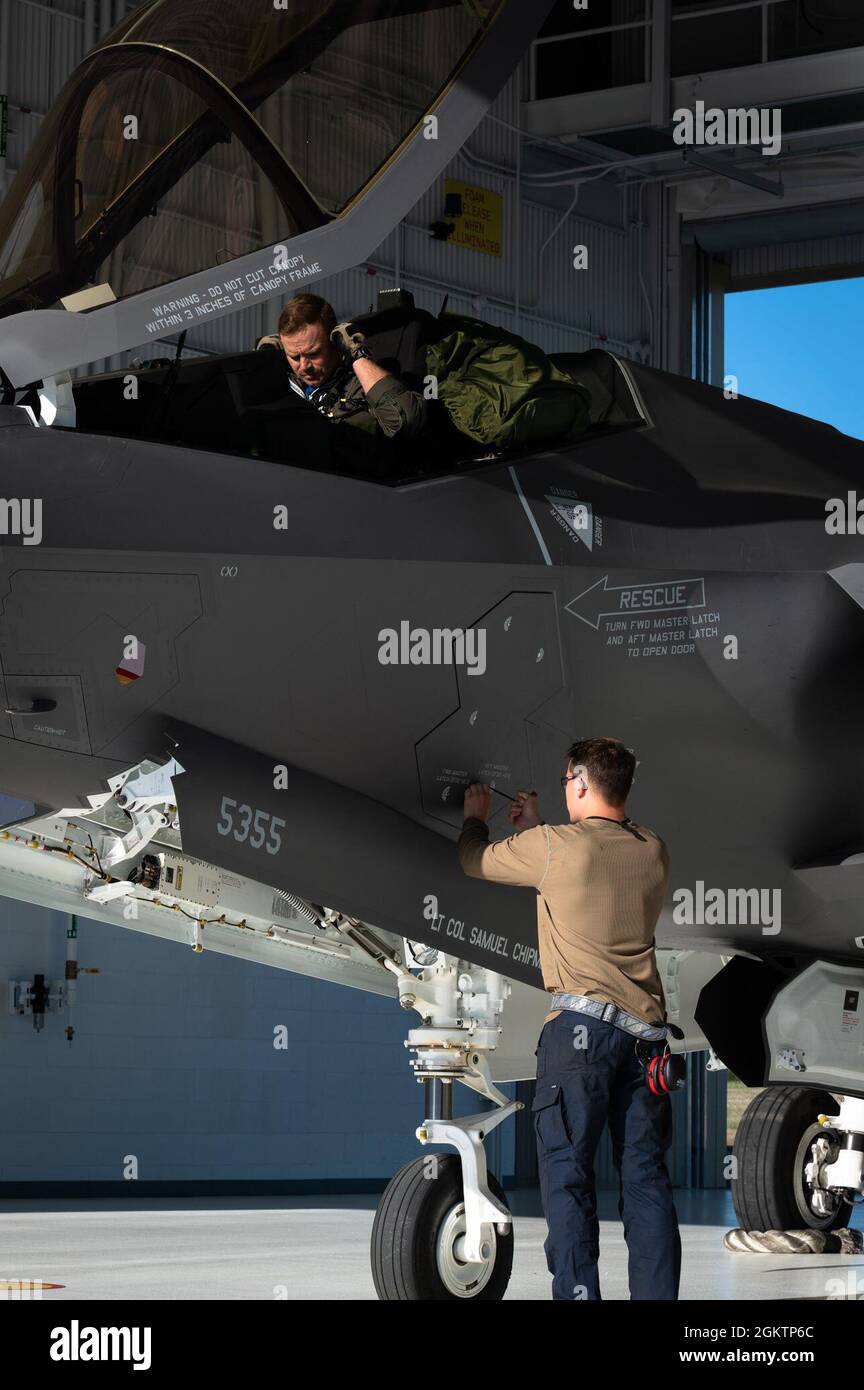 U.S. Air Force Lt. Col. Samuel Chipman, left, the 355th Fighter ...